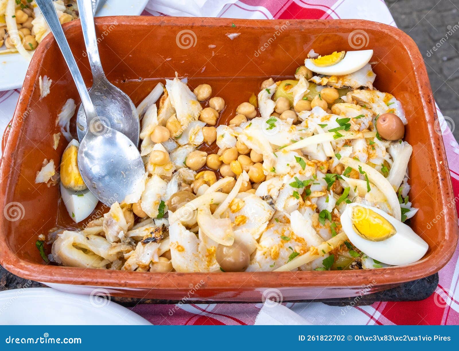 Cod Fish with Chickpeas Potatos and Eggs. Traditional Portuguese ...
