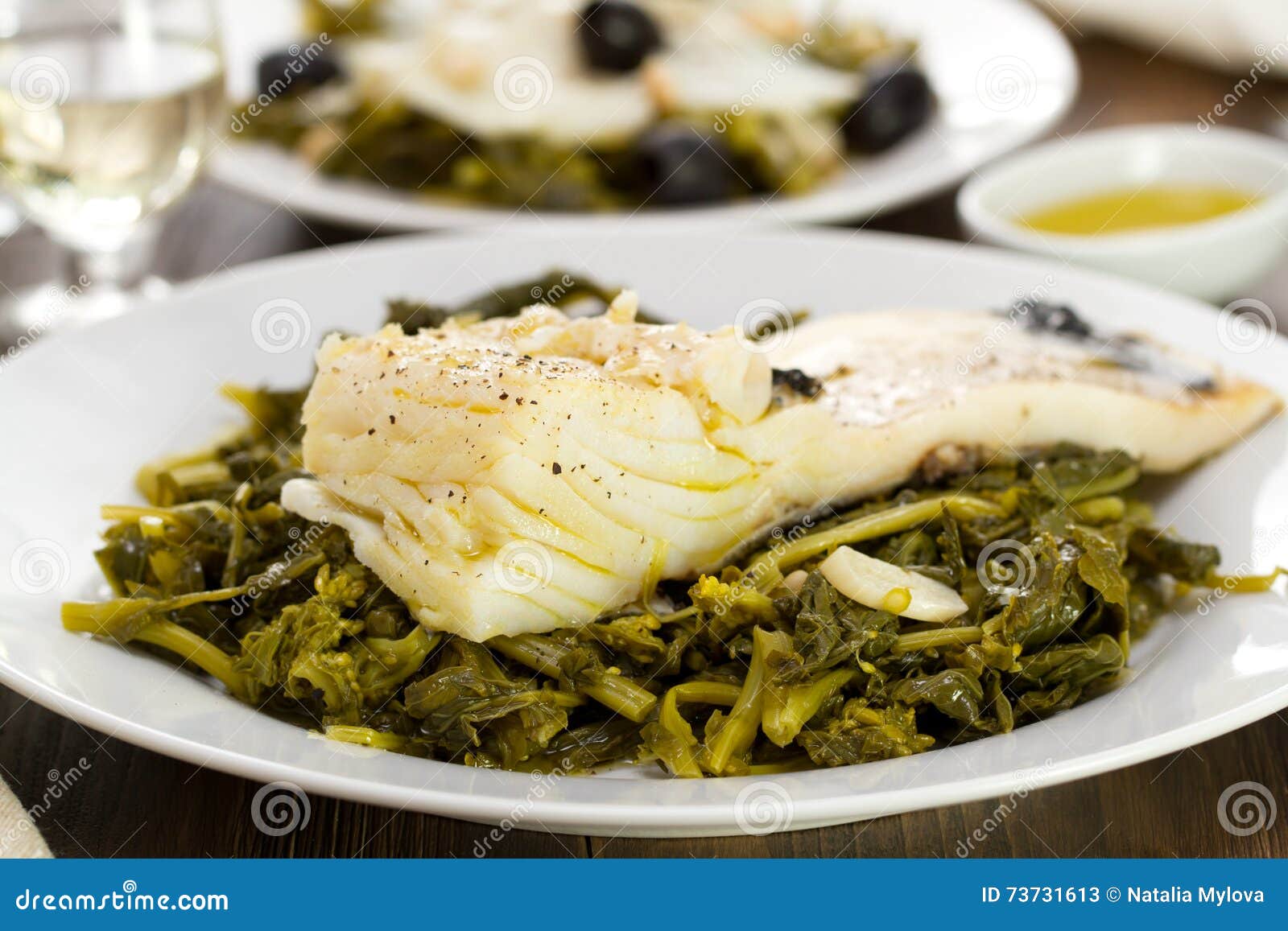 Cod fish with greens stock image. Image of greens, boiled - 73731613