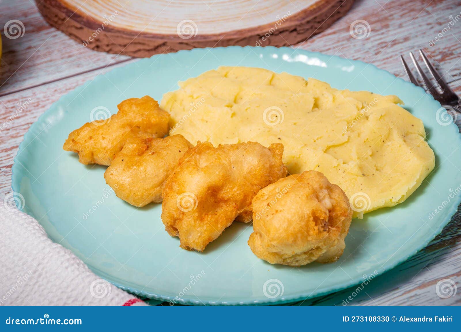 Cod Fish with a Potato Garlic Mash - Bakaliaros Skordalia Stock Photo ...