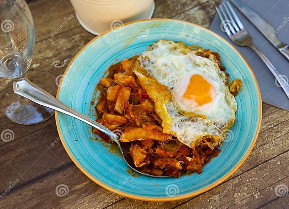 Cod Fish Served with Eggs and Garlic Stock Photo - Image of food, slice ...