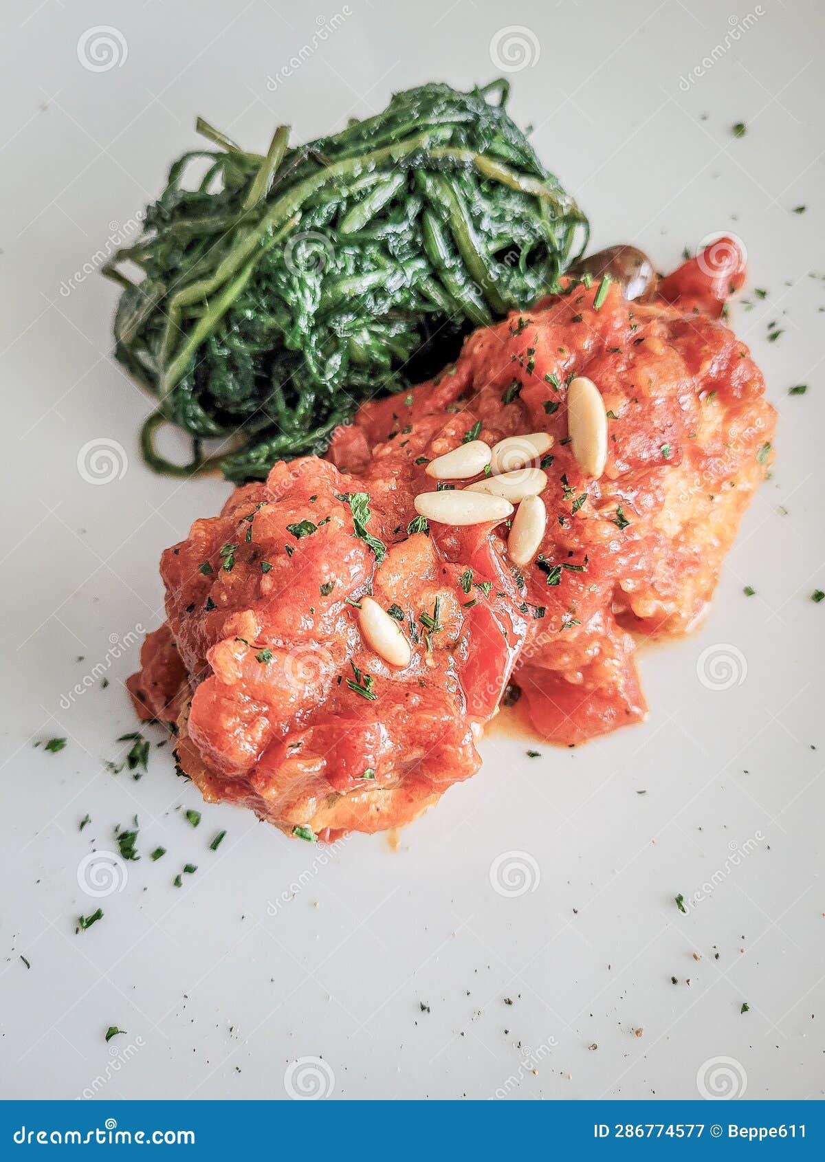 Cod fish in tomato sauce stock image. Image of dining - 286774577