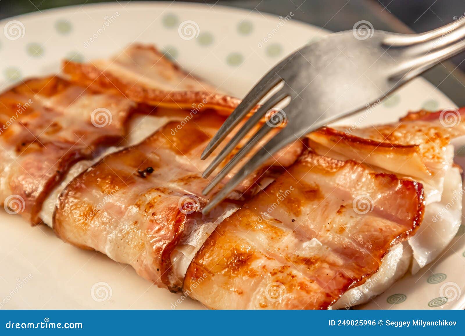 Cod fish wrapped in bacon stock photo. Image of cooked - 249025996