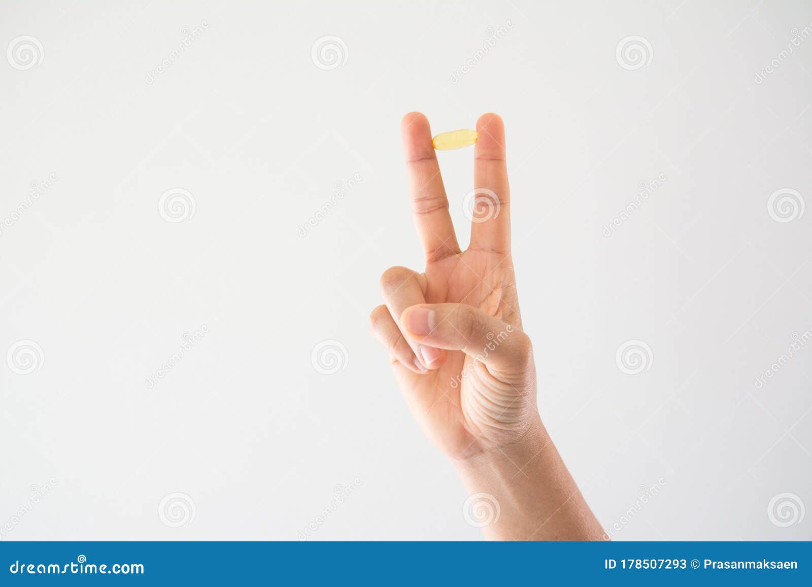 Cod liver oil in hand stock image. Image of nurse, isolated - 178507293