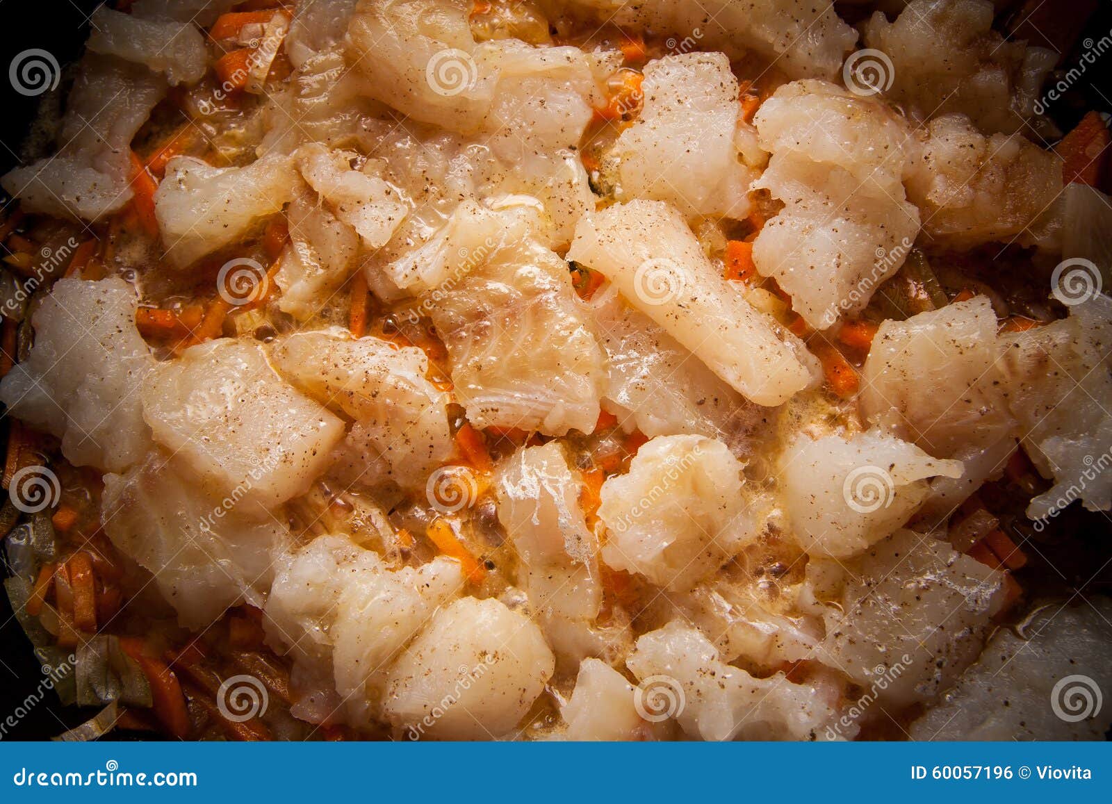 Cod pieces on pan stock photo. Image of onion, food, steaks - 60057196