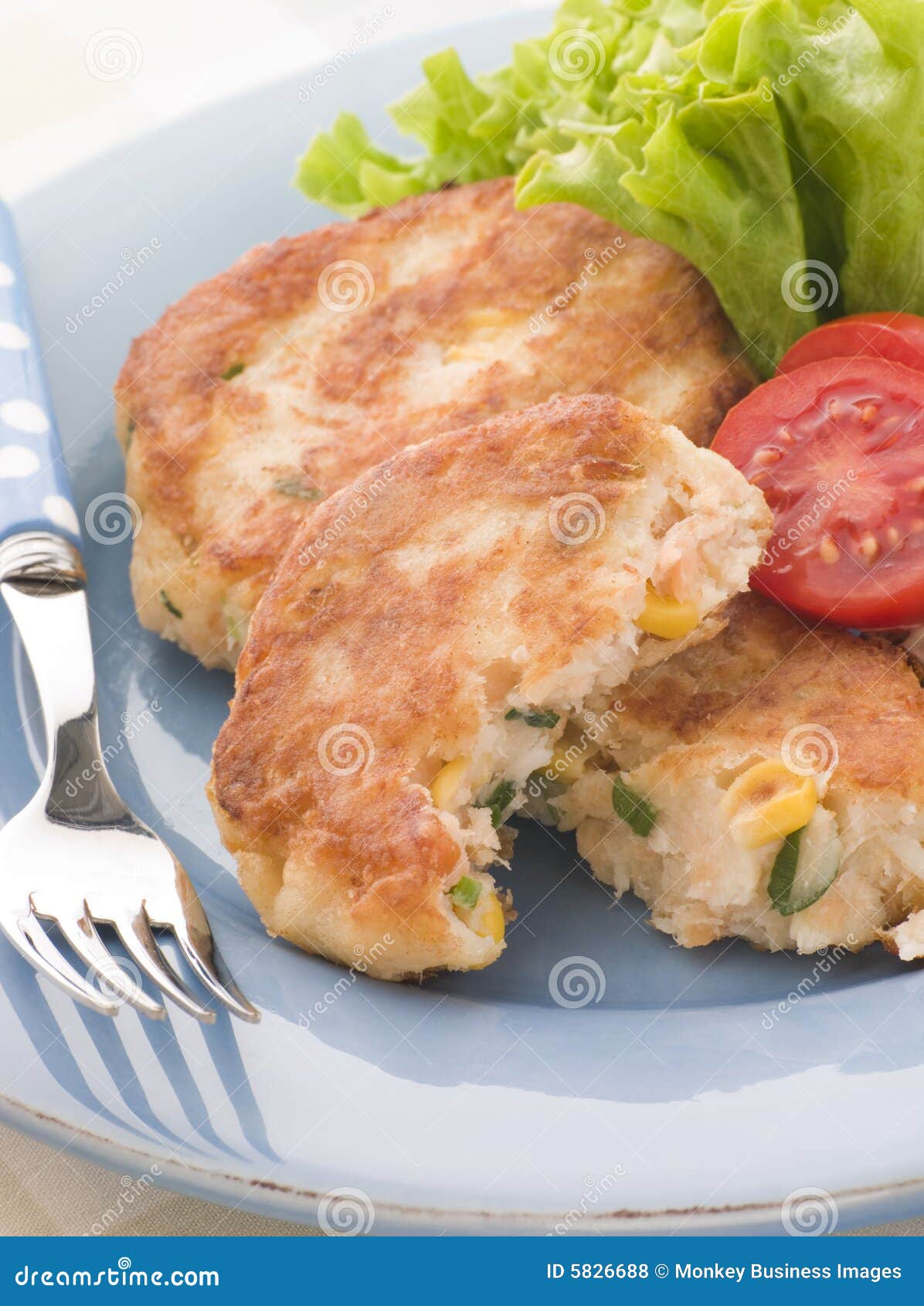Fish Cakes With Spaghetti Hoops And Chips Royalty-Free Stock ...