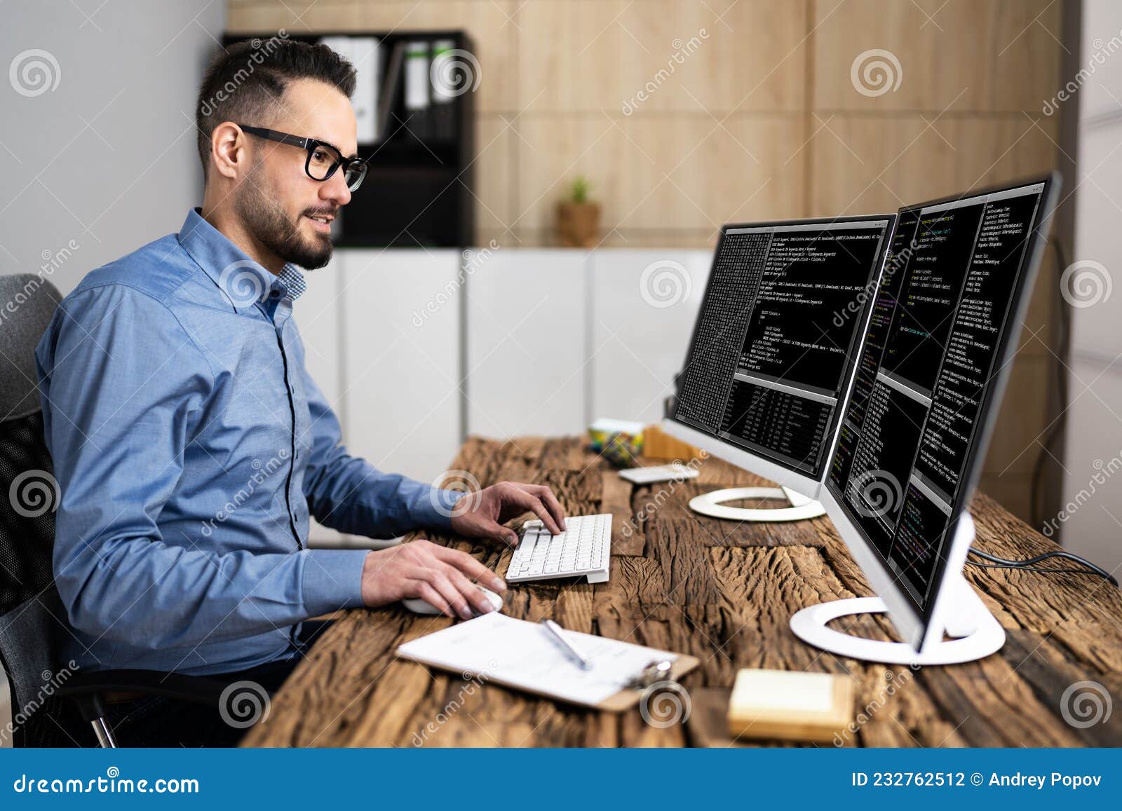 Coder Using Computer at Desk Stock Photo - Image of working, male ...