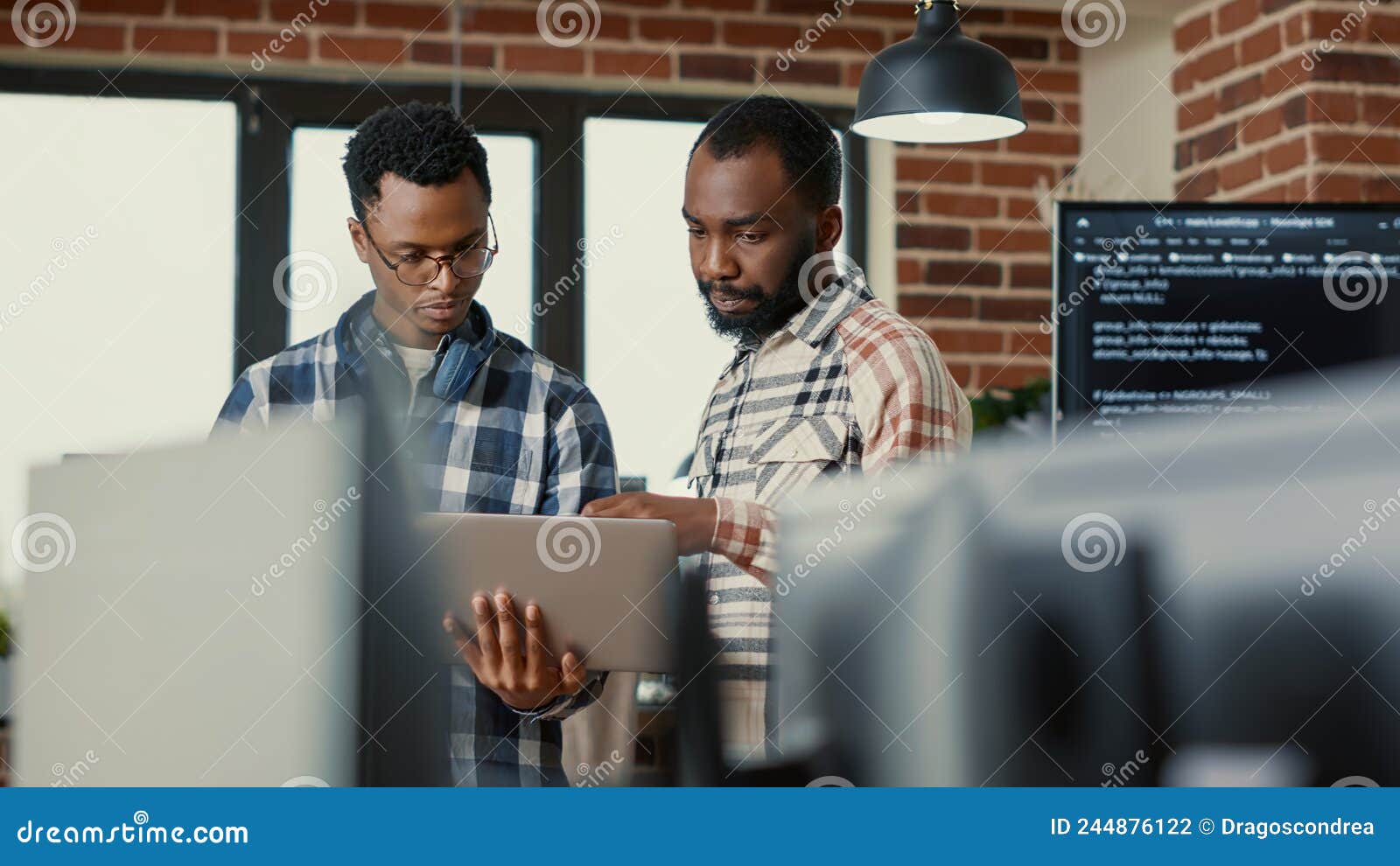 Coders Talking about Algorithms Holding Laptop Pointing at Sorce Code on Screen Stock Photo ...