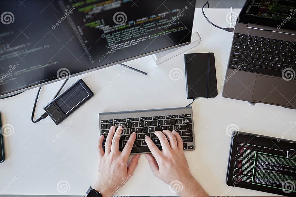 Coding on Keyboard Surrounded by Multiple Monitors Stock Photo - Image ...