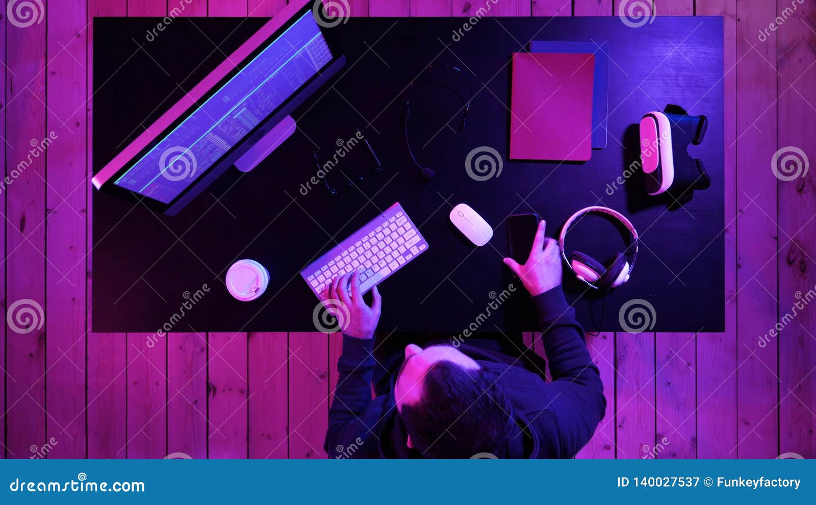 Coding Specialist in Casual with Computer and Talking by Phone while ...