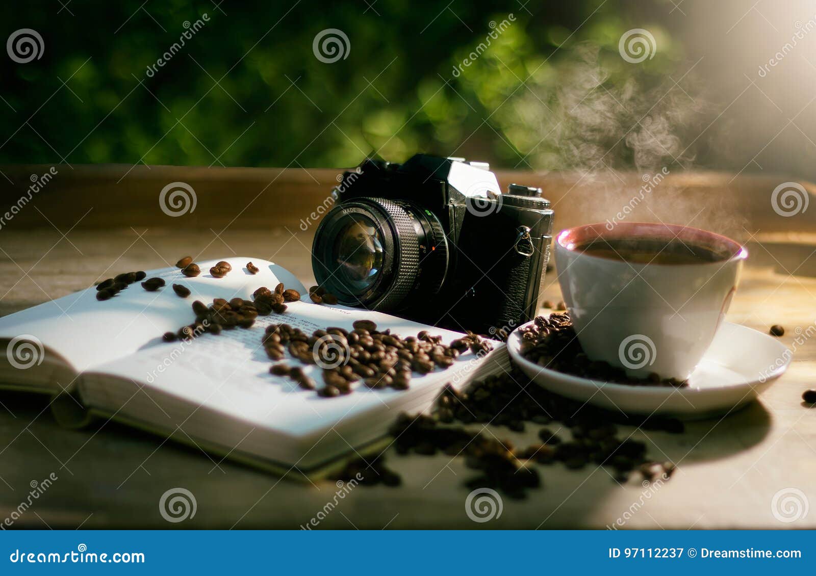 Coffe with book and camera stock image. Image of saucer - 97112237