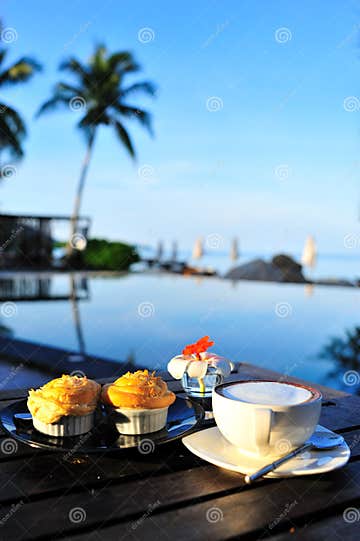 Coffee on the beach stock photo. Image of outdoor, ocean - 19650618