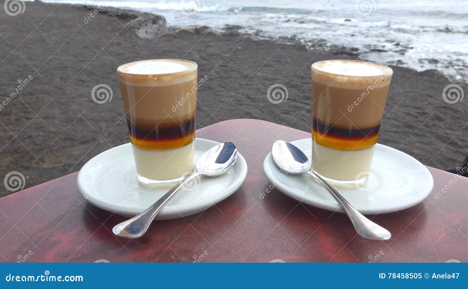 Coffee at the Beach with the Ocean in the Background Stock Image ...