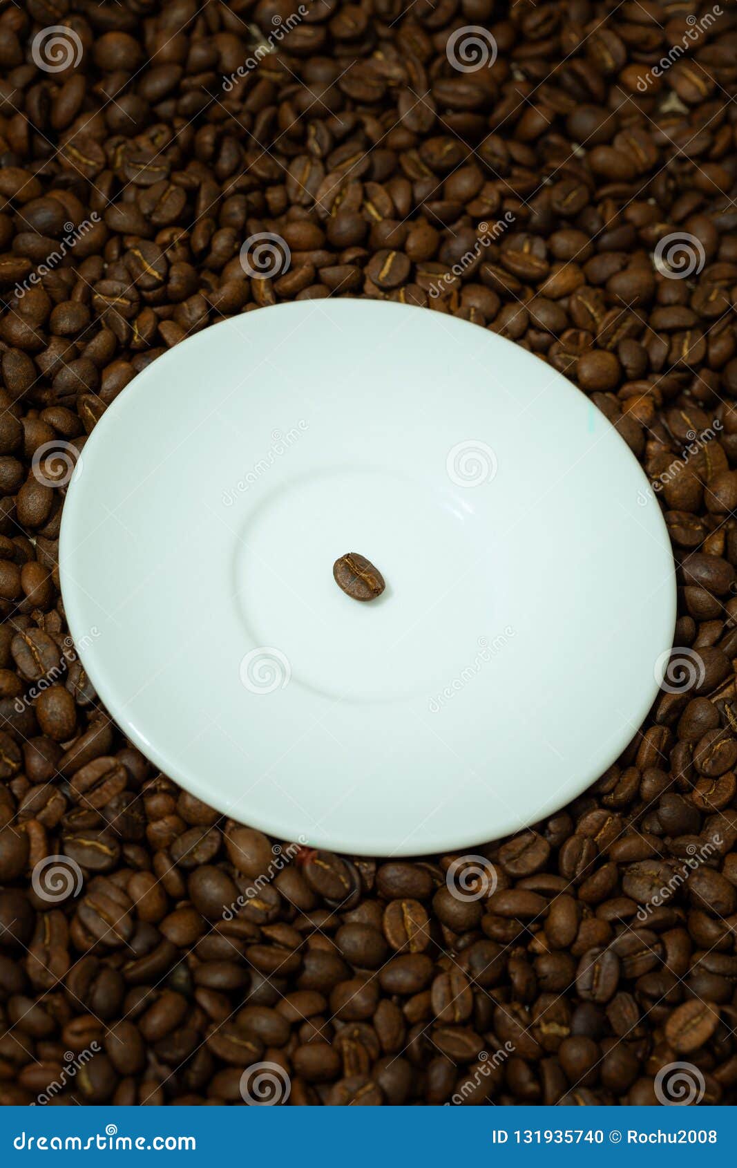 A coffee bean on a plate stock photo. Image of breakfast - 131935740