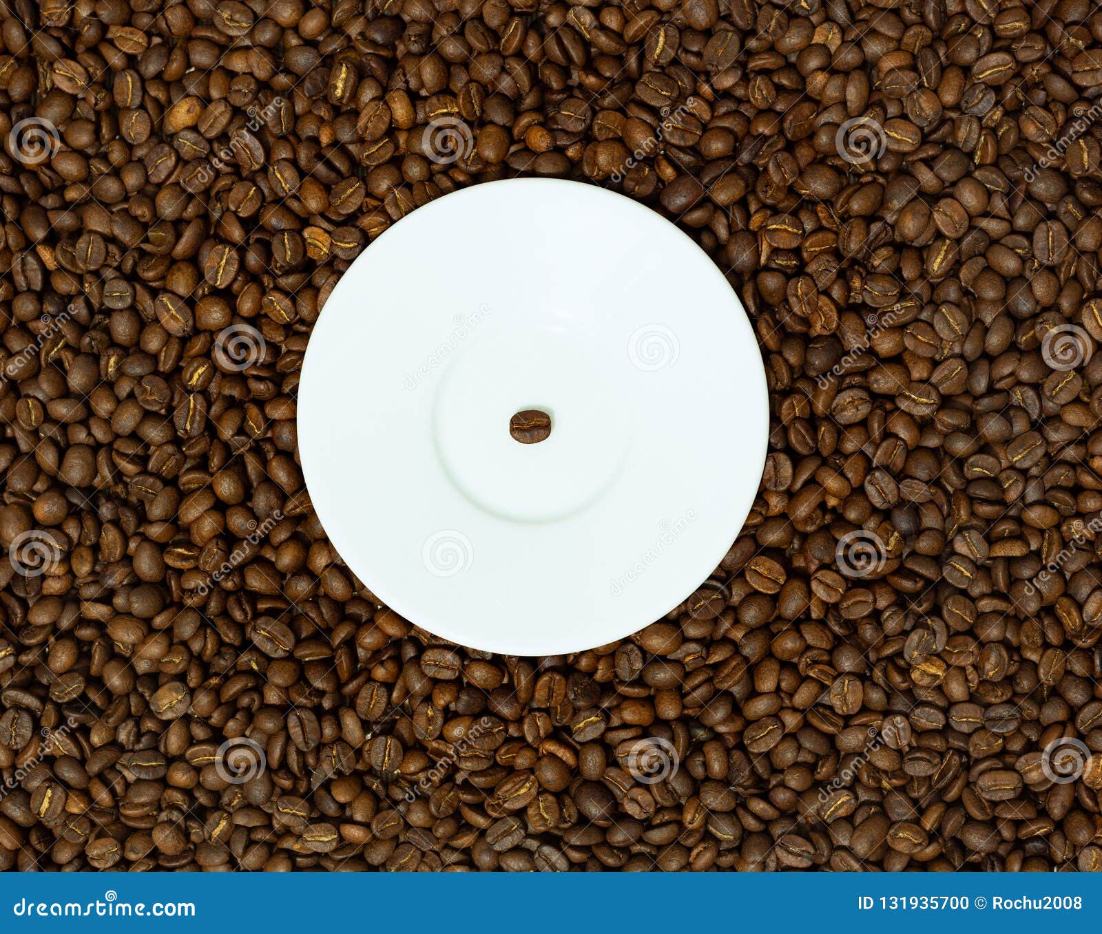 A coffee bean on a plate stock photo. Image of roasted - 131935700