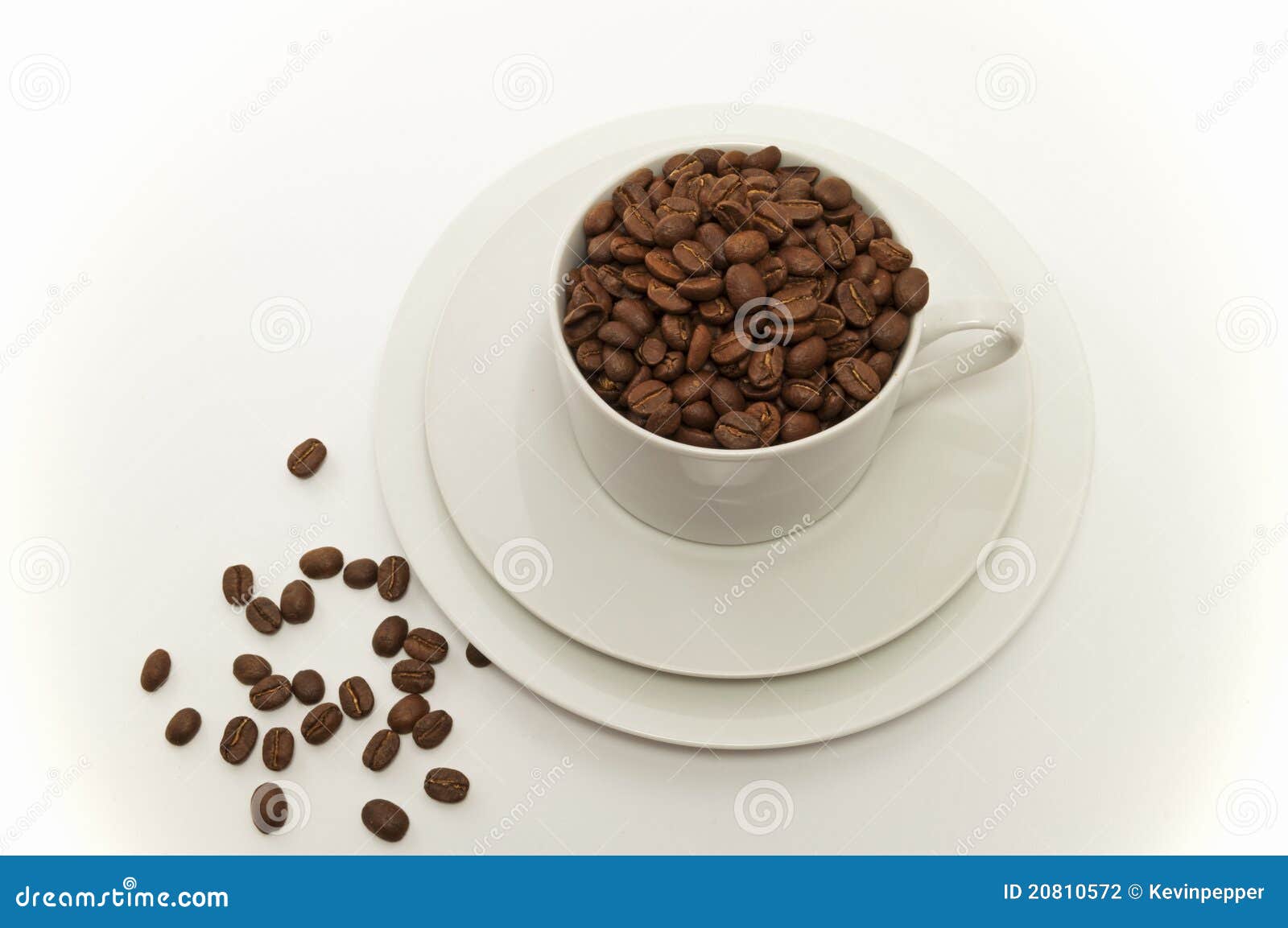 Coffee Beans in a Cup stock photo. Image of plate, brown - 20810572