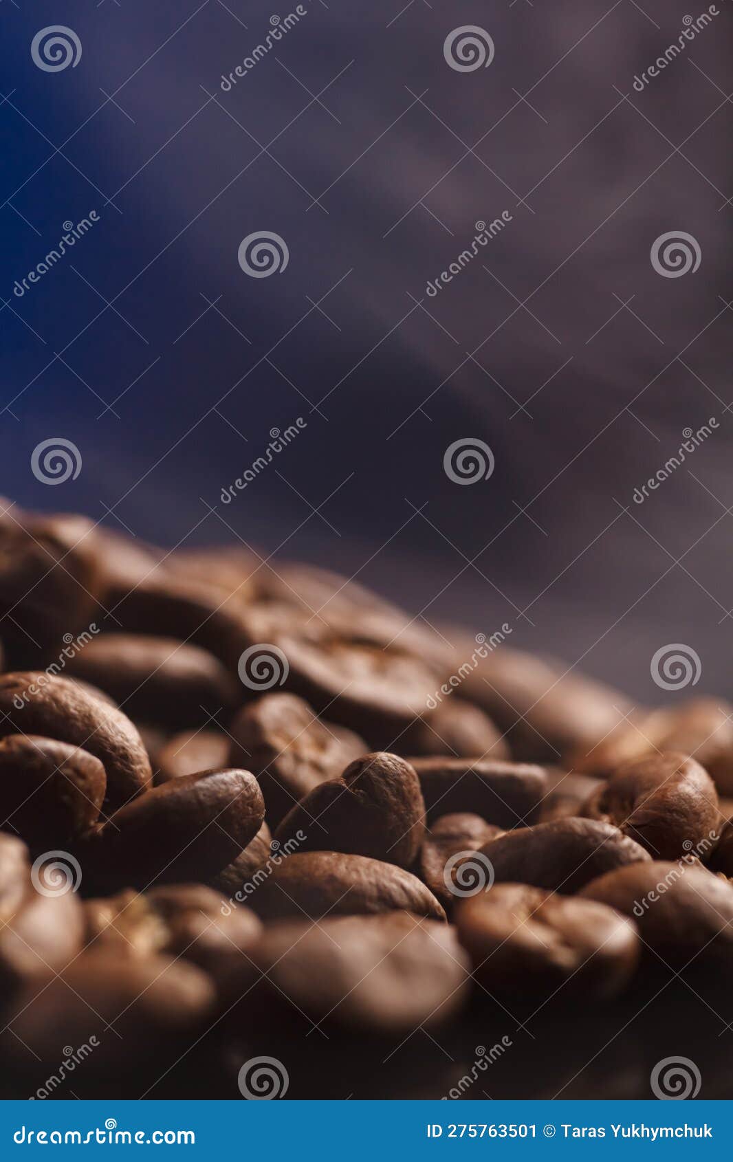 Coffee Beans on a Dark Background with a Blue Highlight on the ...