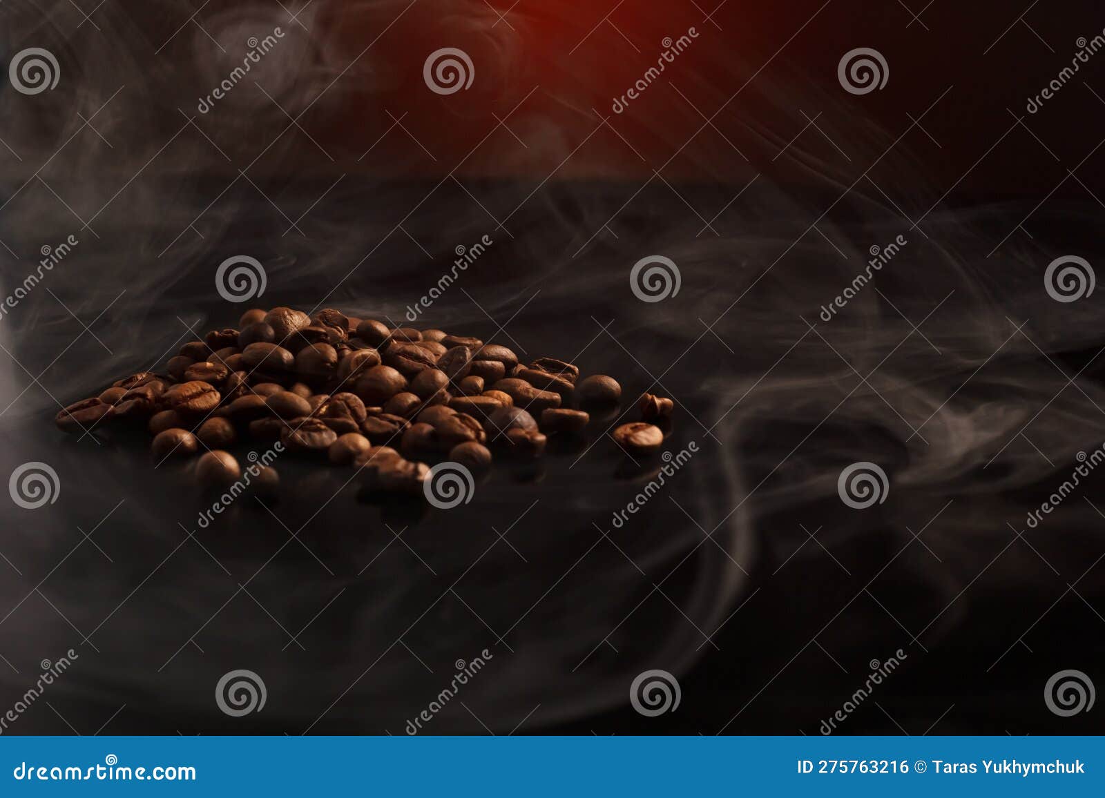 Coffee Beans on a Dark Background with a Red Highlight on the ...
