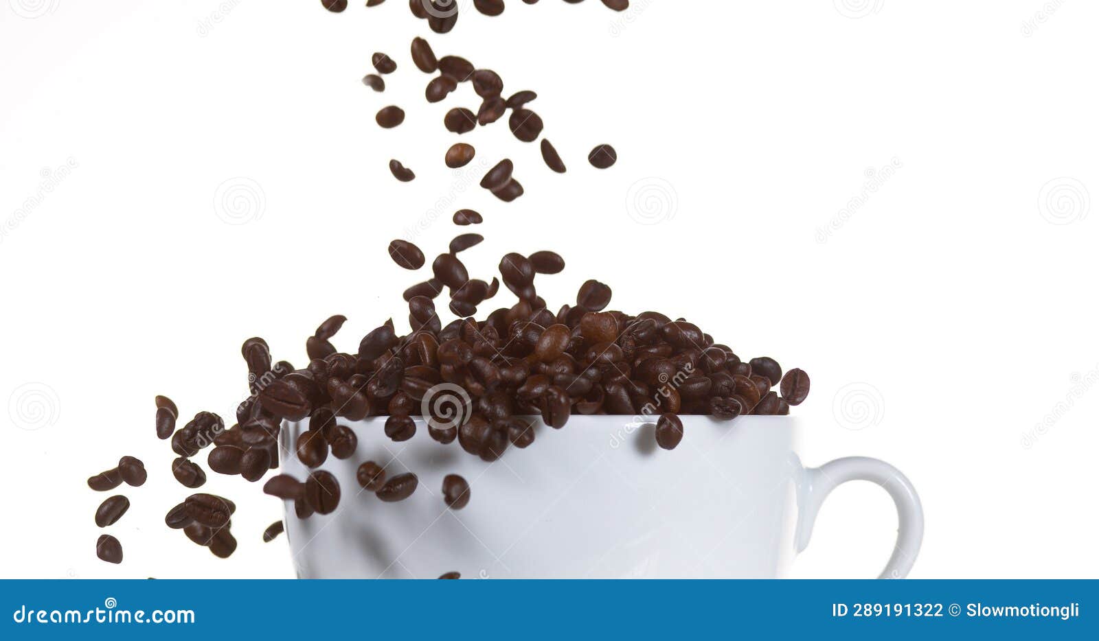 Coffee Beans Falling into a Cup Against White Background Stock Photo ...
