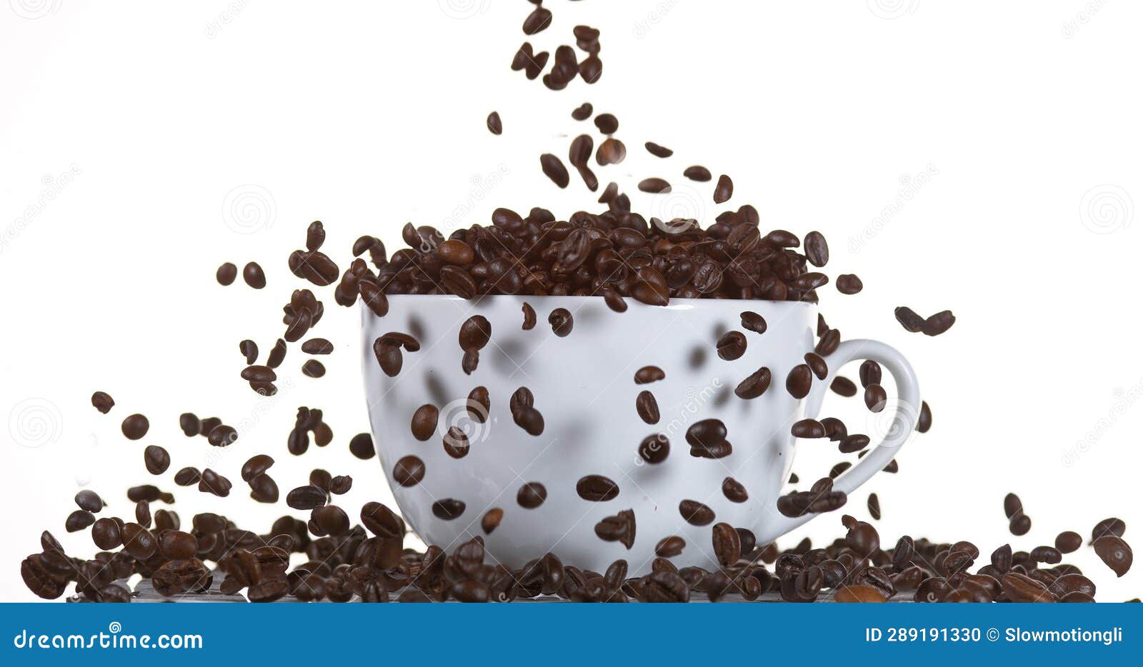 Coffee Beans Falling into a Cup Against White Background Stock Photo ...