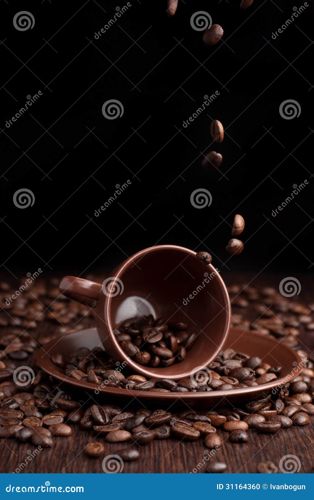 Coffee beans flow in a cup stock photo. Image of beans - 31164360
