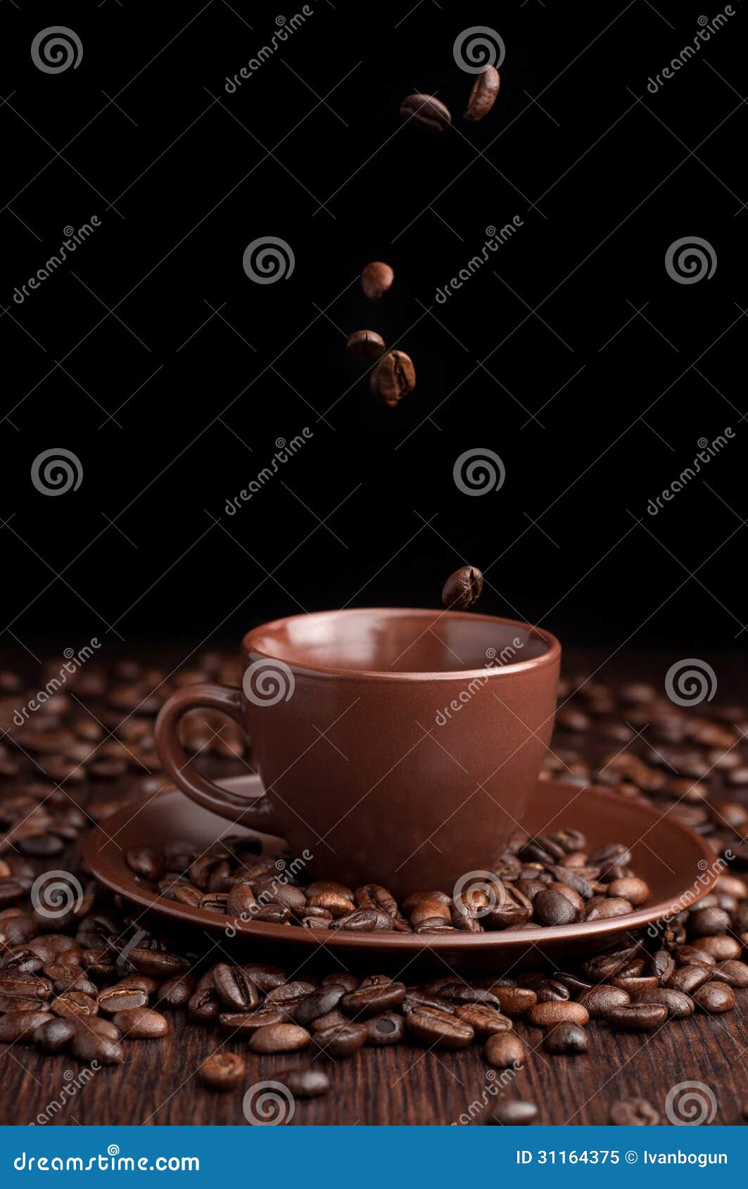 Coffee beans flow in a cup stock image. Image of brown - 31164375