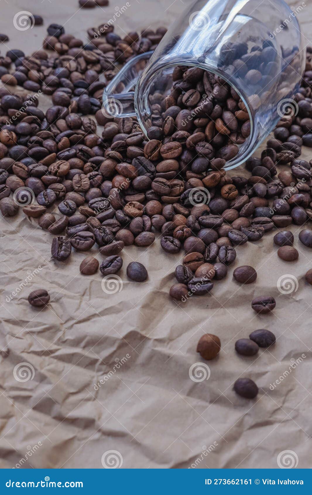 Coffee Beans in a Glass Cup on Brown Paper Background Stock Image ...