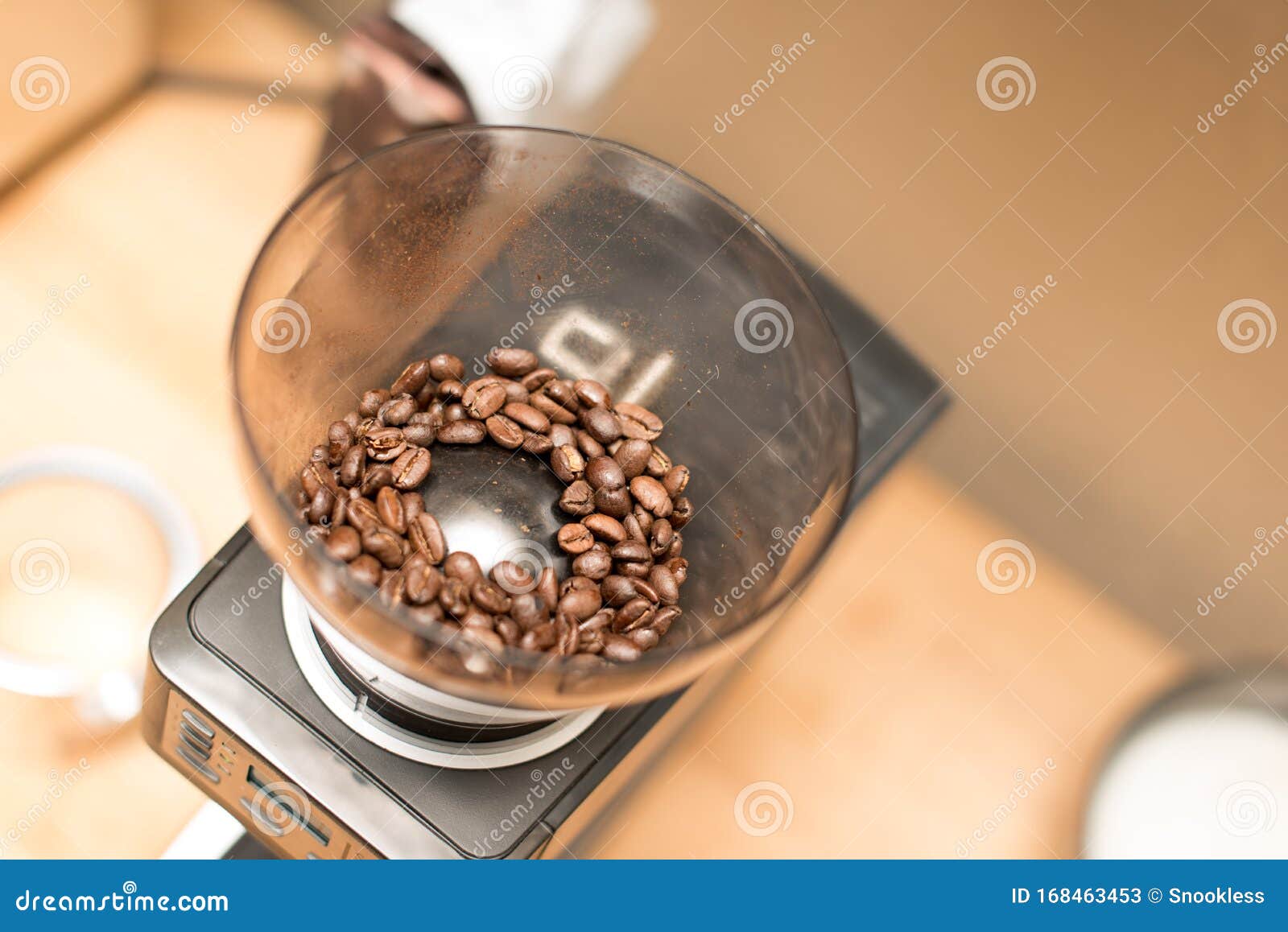 Coffee beans in grinder stock image. Image of aromatic - 168463453