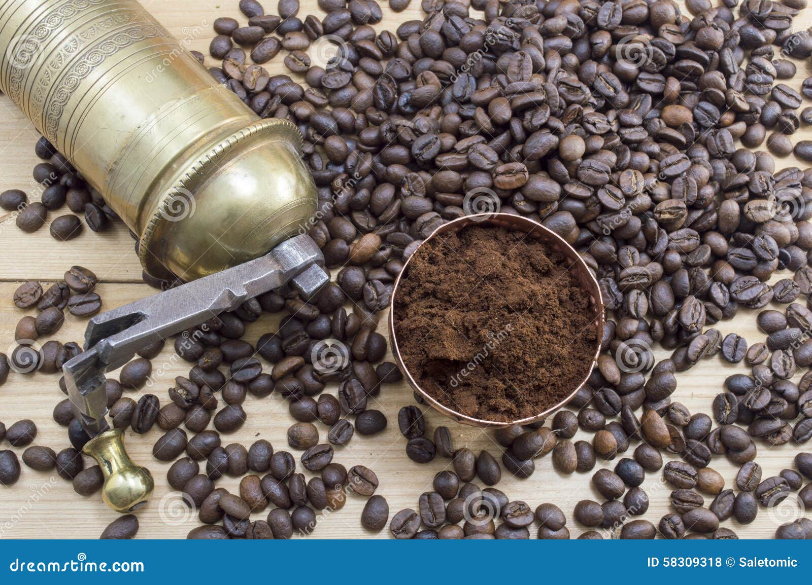 Coffee Beans, Grinder and on a Wooden Table with Grounded Coffe Stock ...