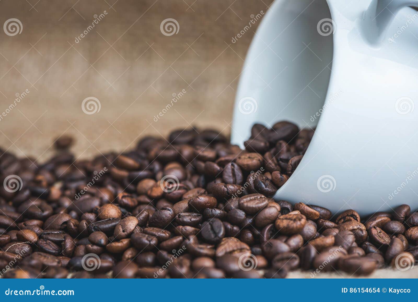 Coffee Beans Spilled Out of Cup Stock Photo - Image of espresso ...