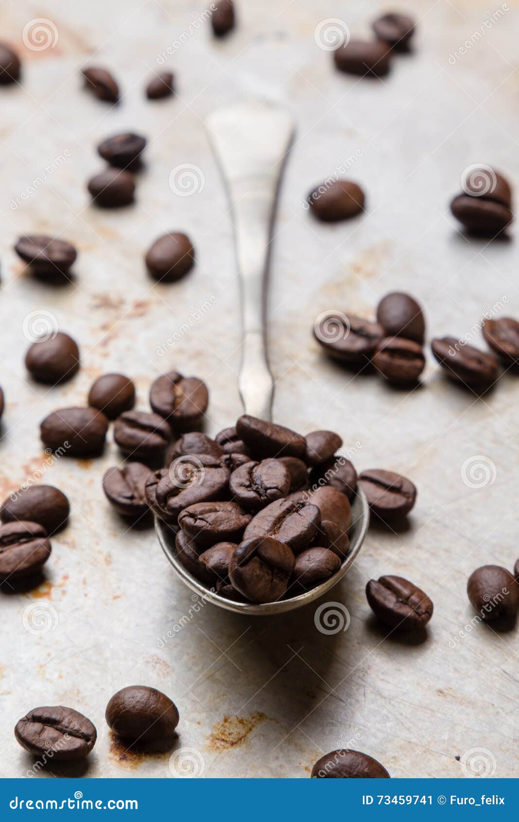 Coffee beans on spoon stock image. Image of roast, beans - 73459741