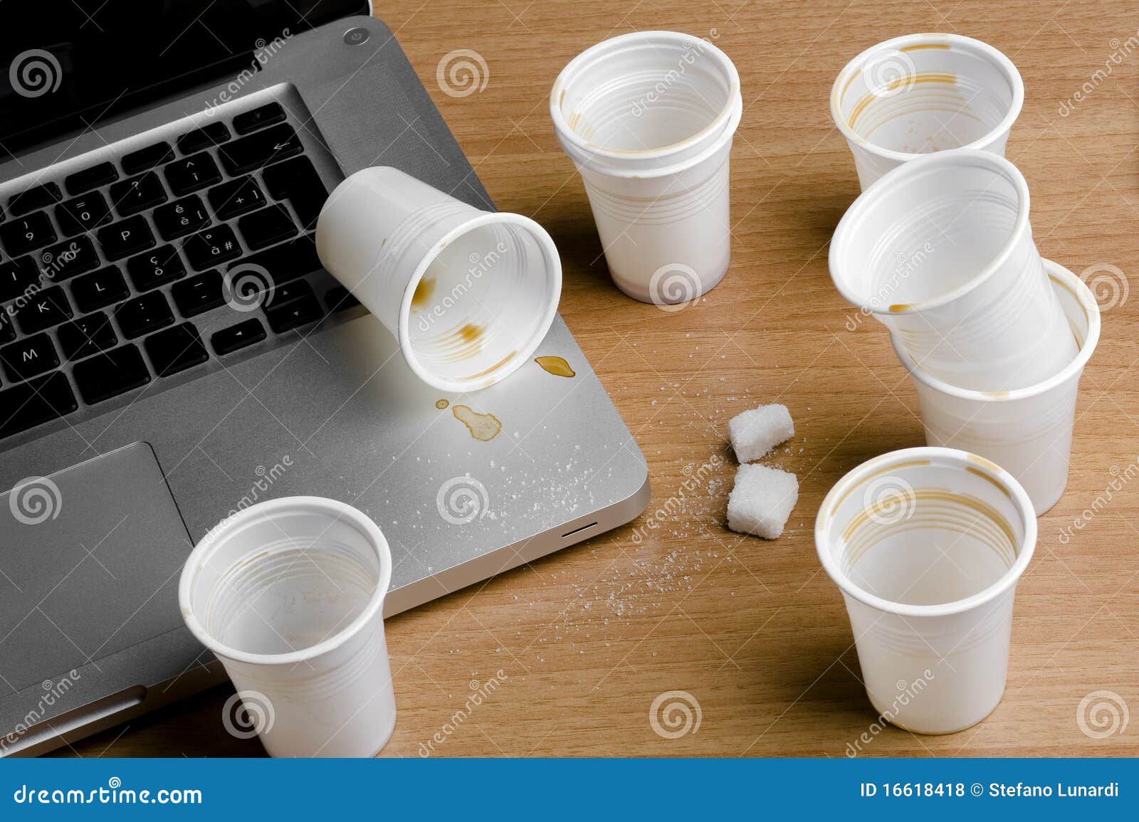 Coffee Being Dropped on Laptop Stock Photo - Image of copy, group: 16618418