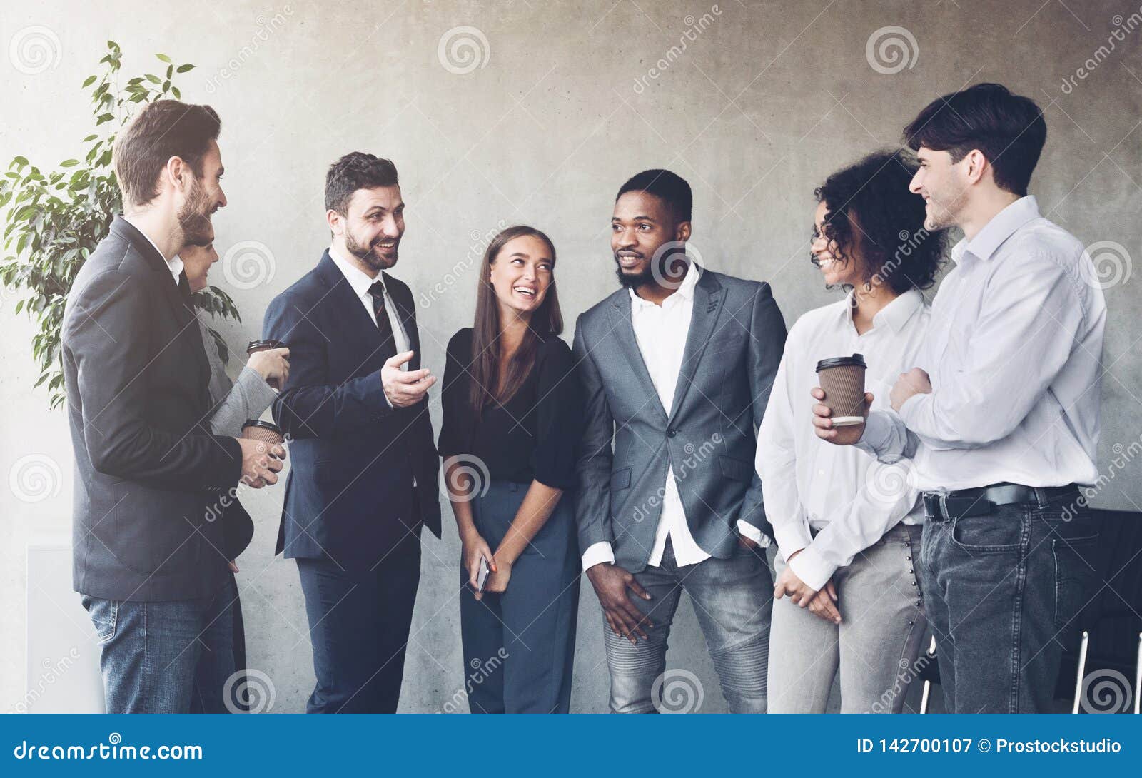 Coffee Break Chat. Business People Talking in Office Stock Image ...