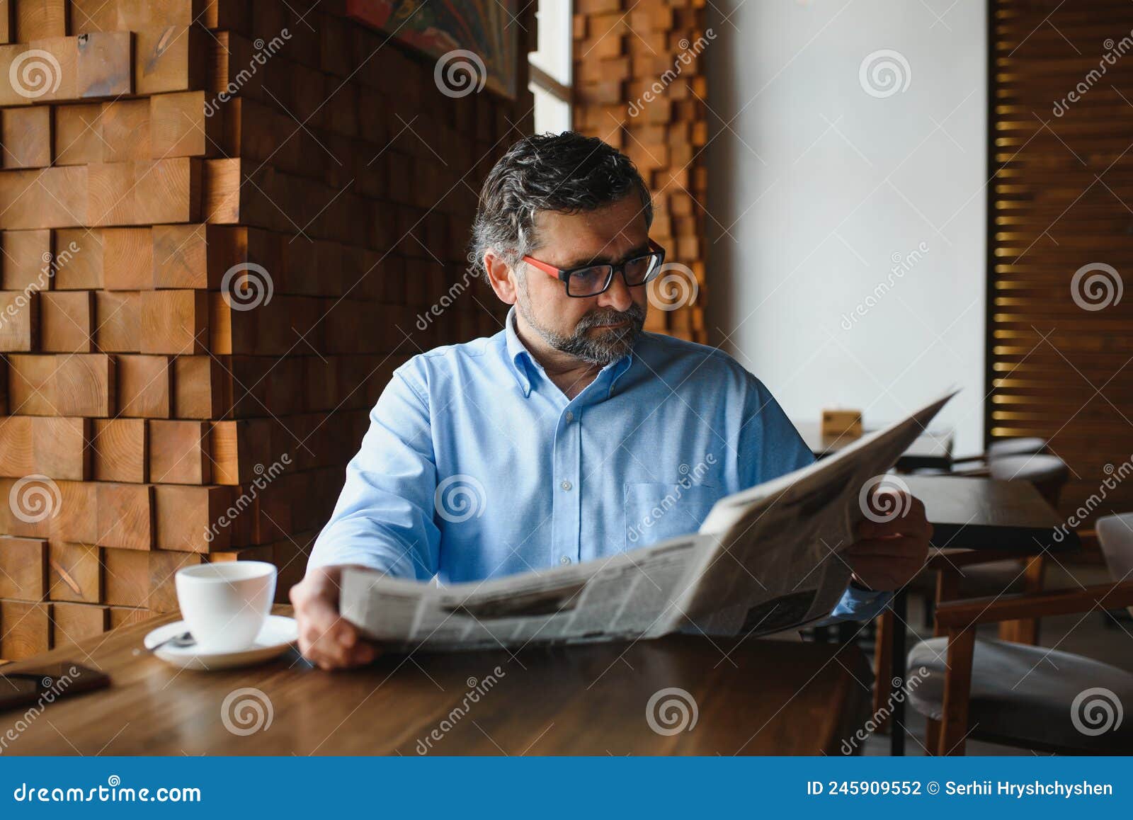 Coffee Break. Man Drinking Coffee and Reading Newspaper in Cafe Bar ...