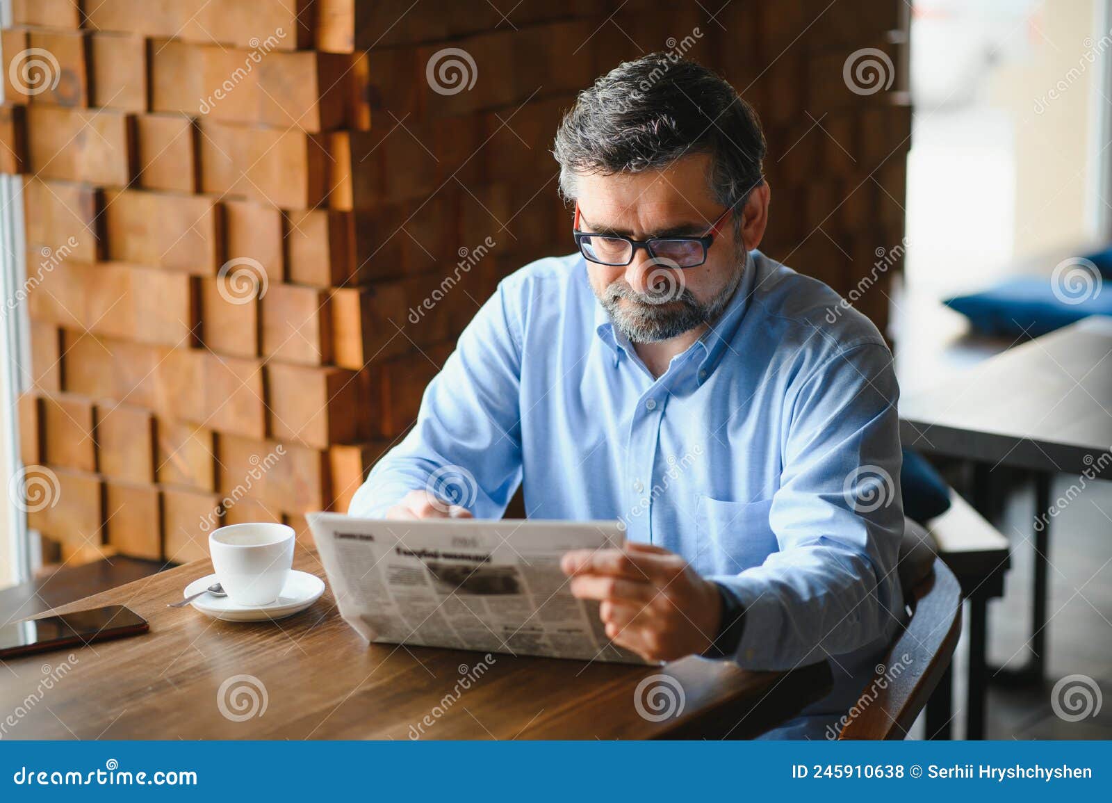 Coffee Break. Man Drinking Coffee and Reading Newspaper in Cafe Bar ...