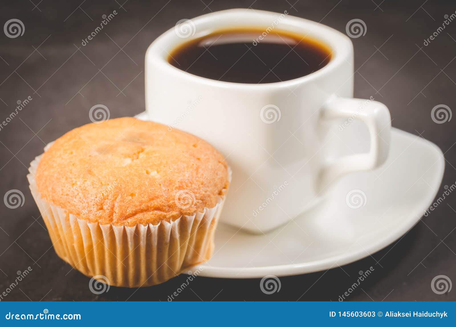 Coffee Break. White Cup of the Hot Black Coffee and Muffin. Breakfast ...