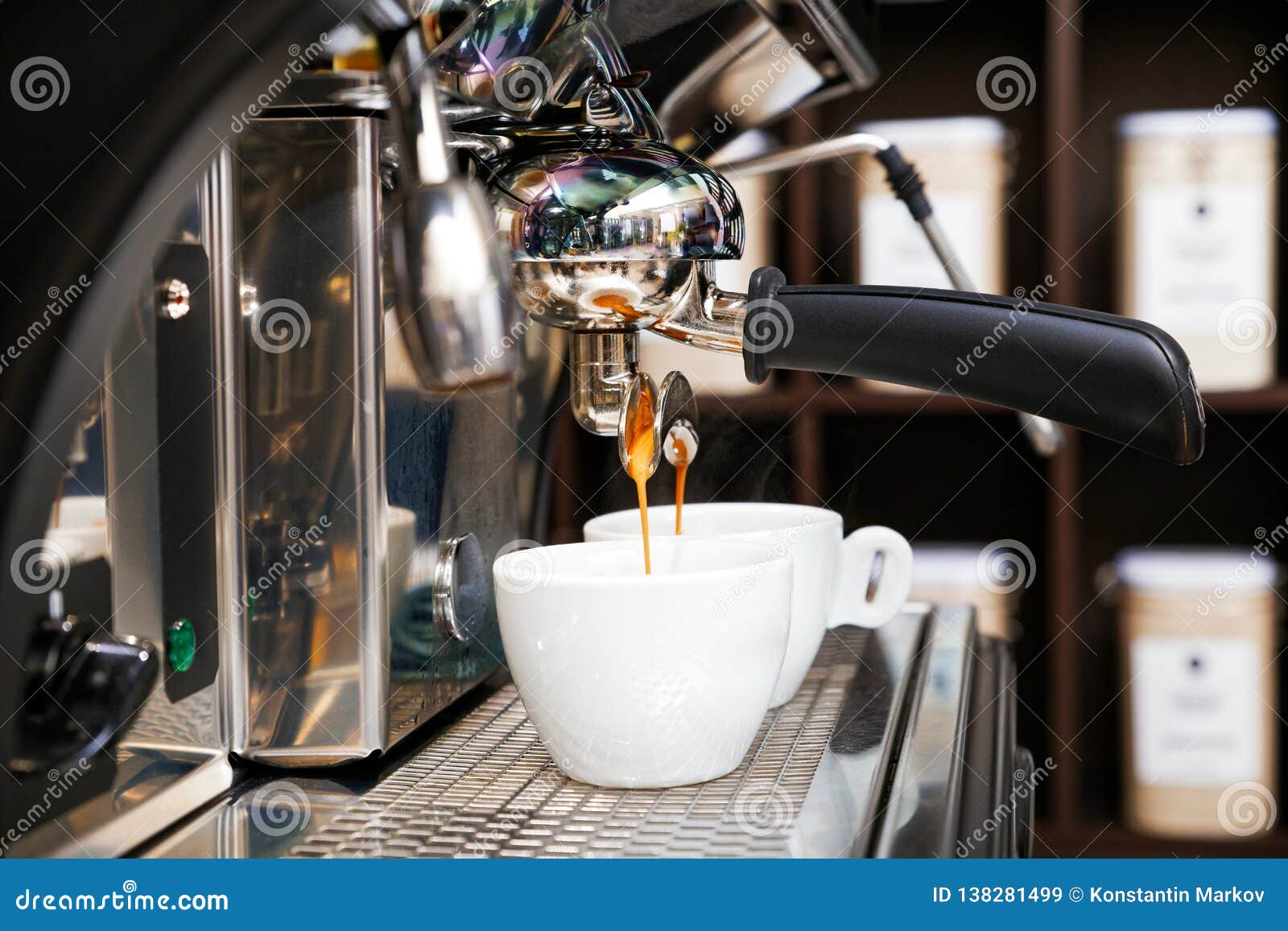 Coffee Brewing in Coffee Machine. Espresso Pouring in Two Cups Stock ...