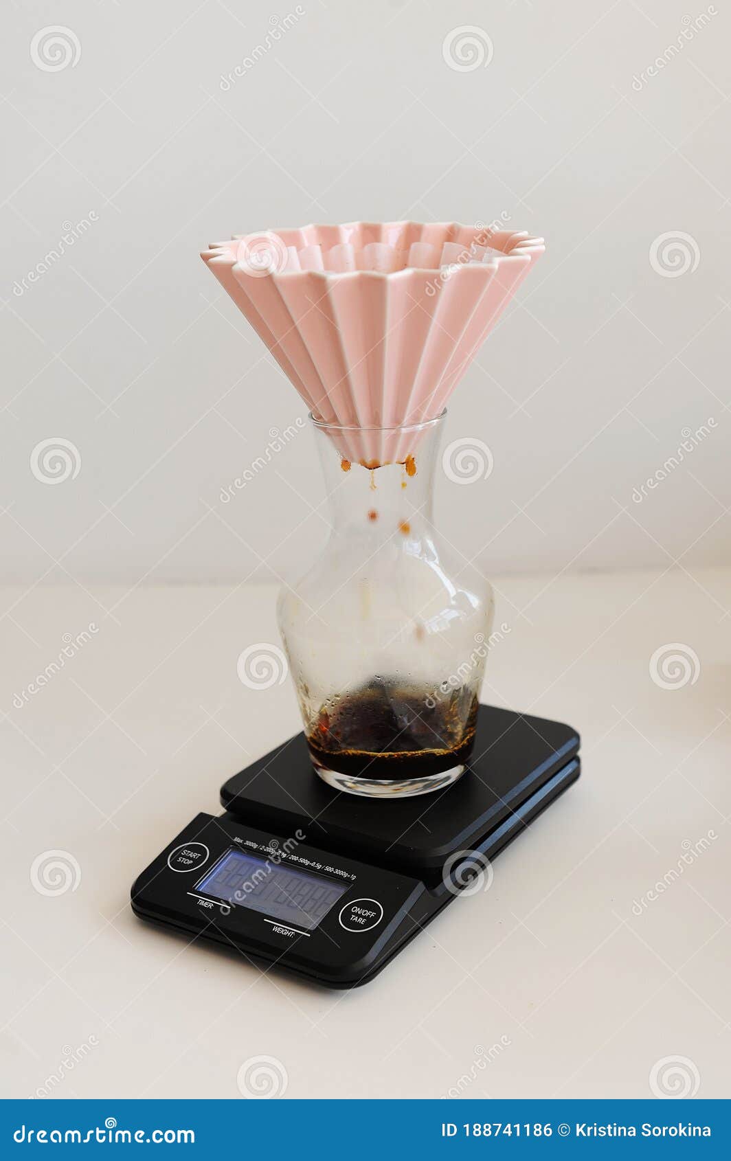 Coffee Brewing in Origami Dripper on Electronic Scale Stock Photo ...