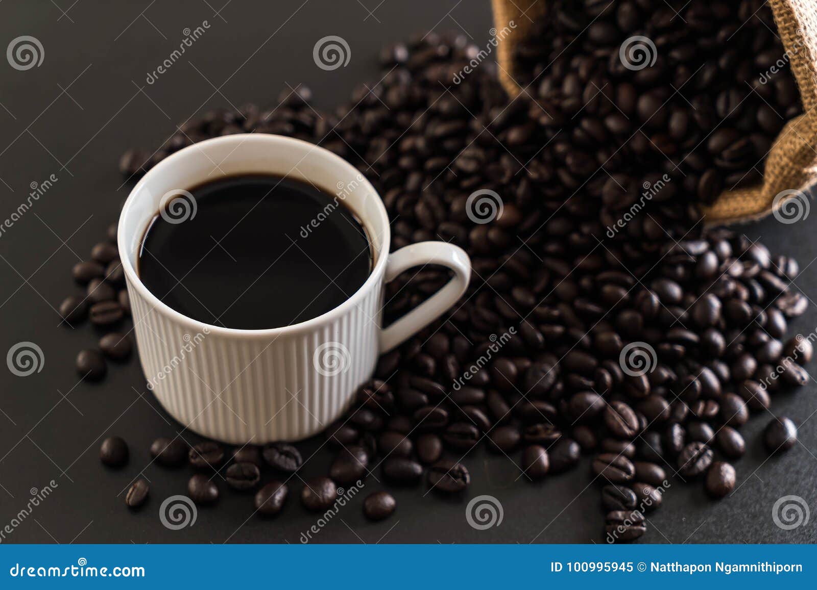 Coffee cup and beans stock image. Image of grain, caffeine - 100995945