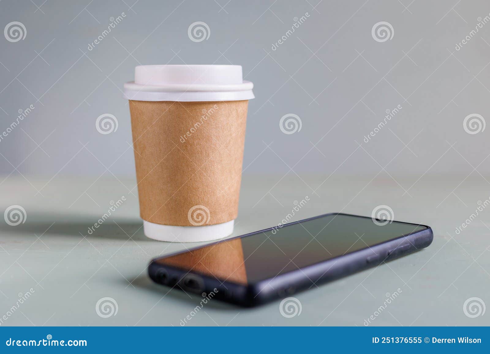 Coffee Cup and Cell Phone on Pale Background Stock Image - Image of ...