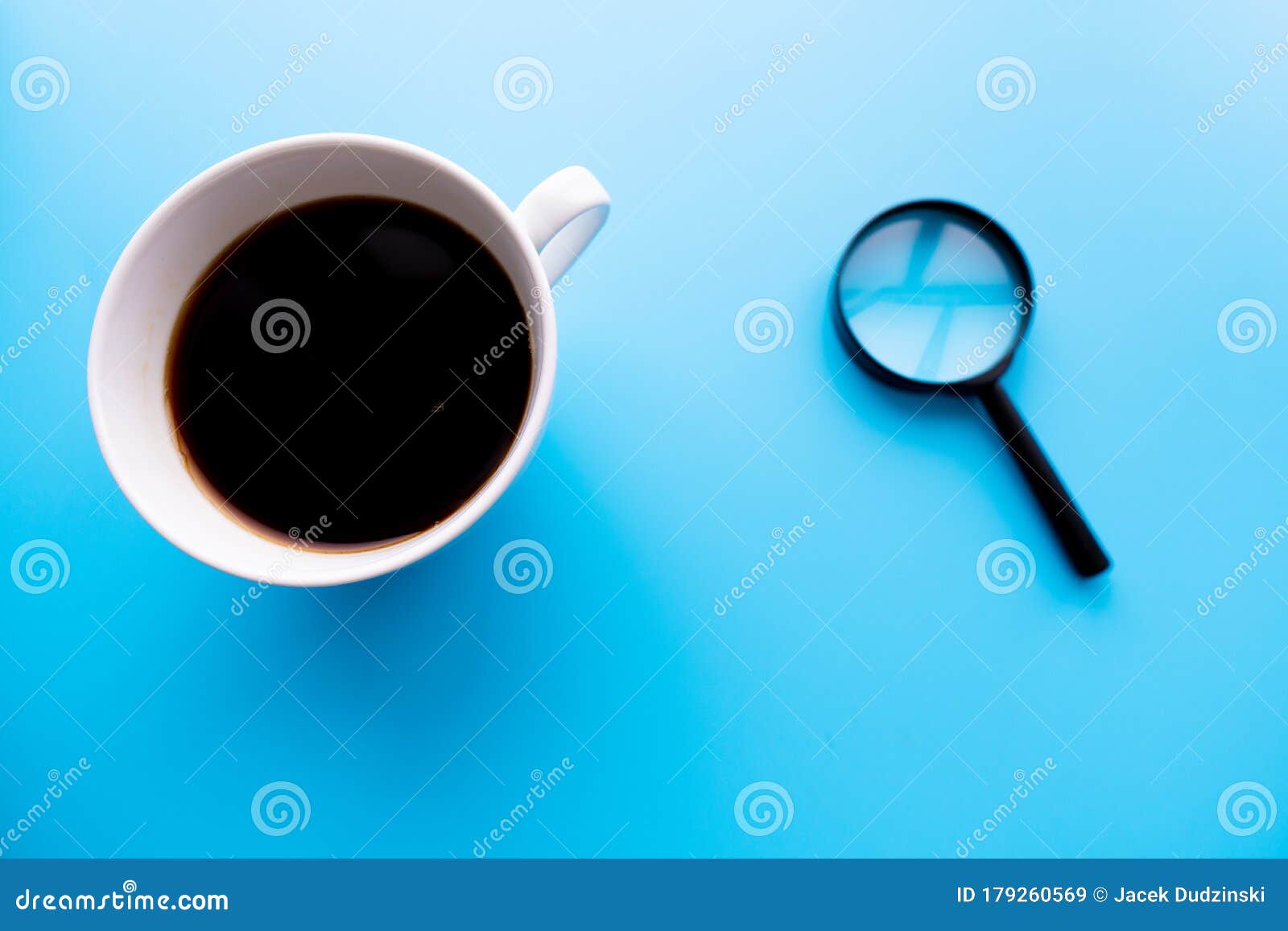 Coffee Cup and Coffee with Magnifying Glass on Blue Background. Top ...
