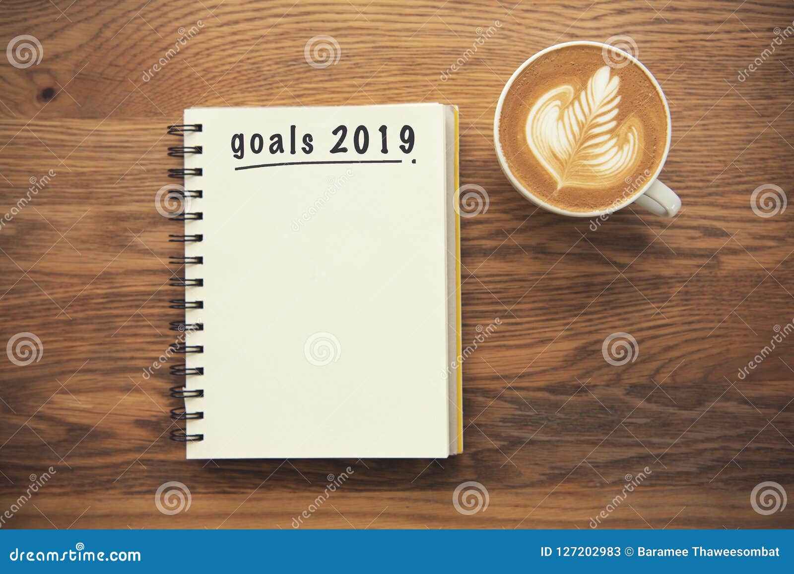 Coffee Cup and Notebook with Goals 2019 on Rustic Desk Stock Image ...
