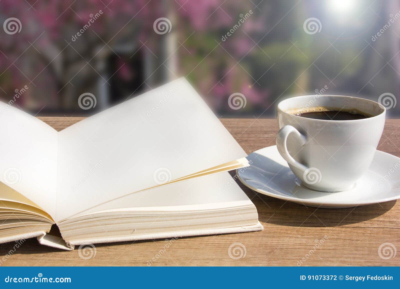 Coffee cup with open book stock photo. Image of table - 91073372