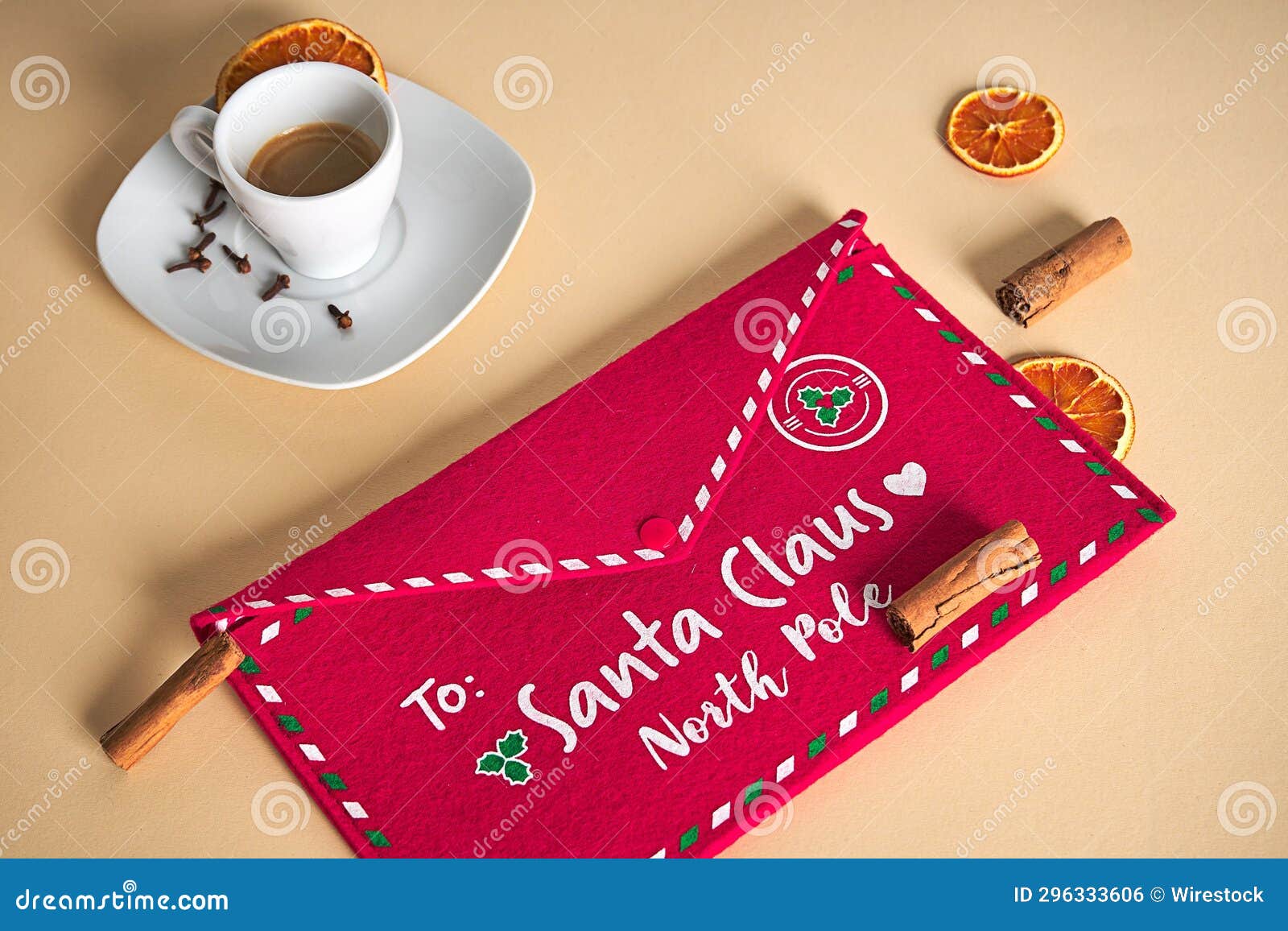 Coffee Cup and an Orange Slice with a Santa Claus Note in the Center ...