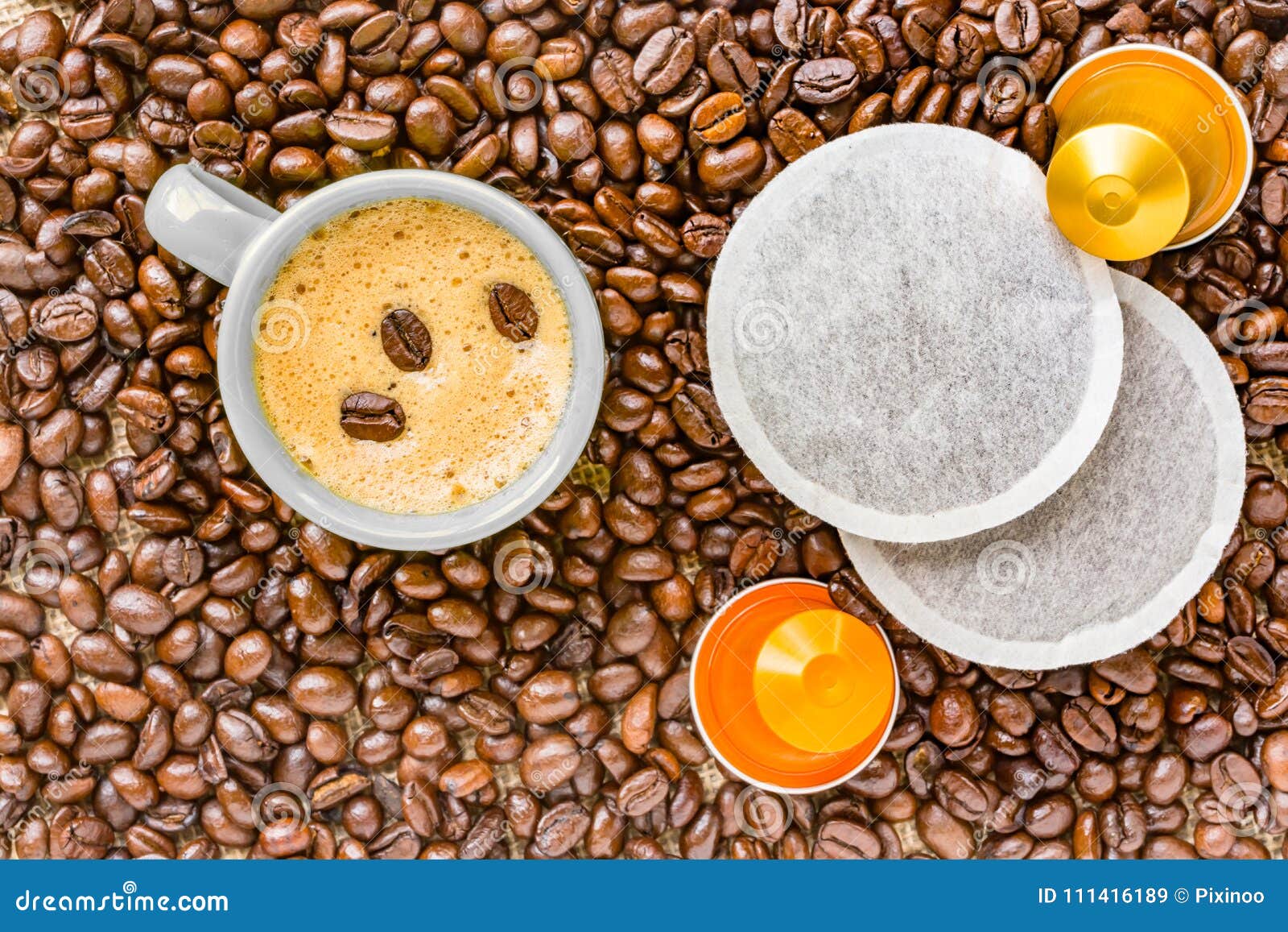 Coffee Cup Placed on a Bed of Coffee Beans with Capsules Stock Image ...