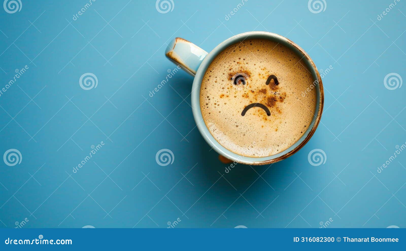 A Coffee Cup with a Sad Face Drawn on the Coffee Milk Foam, Ai ...