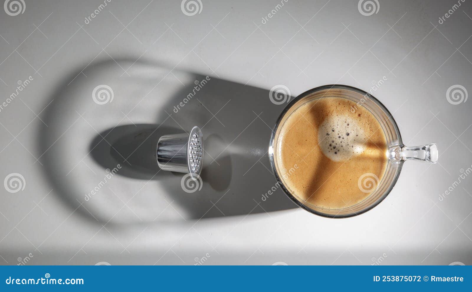 Coffee Cup with Shadow Projected on a White Table Stock Photo - Image ...