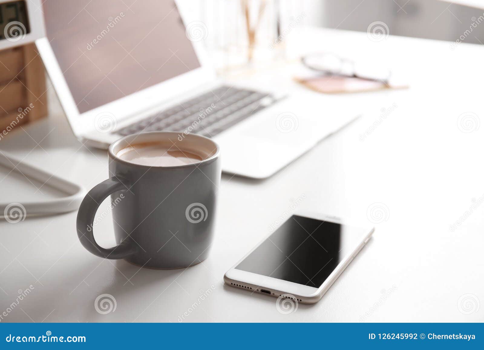 Coffee Cup on Table at Modern Workplace Stock Photo - Image of computer ...