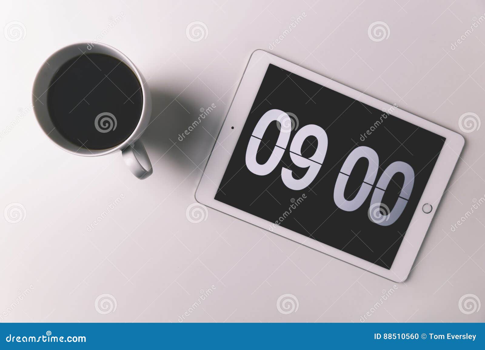 Coffee Cup with Time Display on Digital Clock on Tablet Computer Stock ...