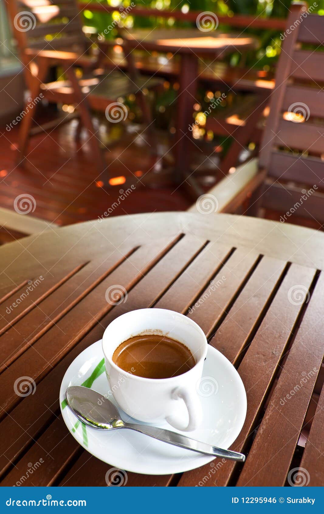 Coffee cup on wood table stock photo. Image of coffee - 12295946