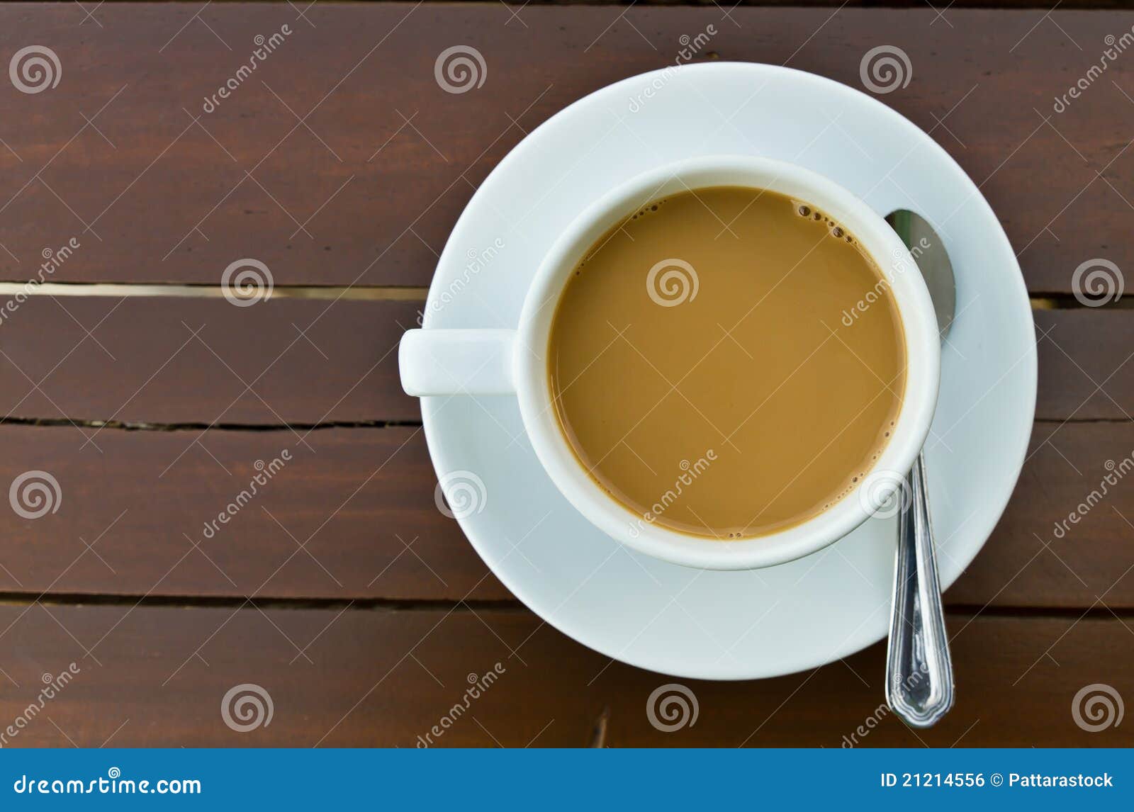 Coffee cup on wood table stock photo. Image of latte - 21214556